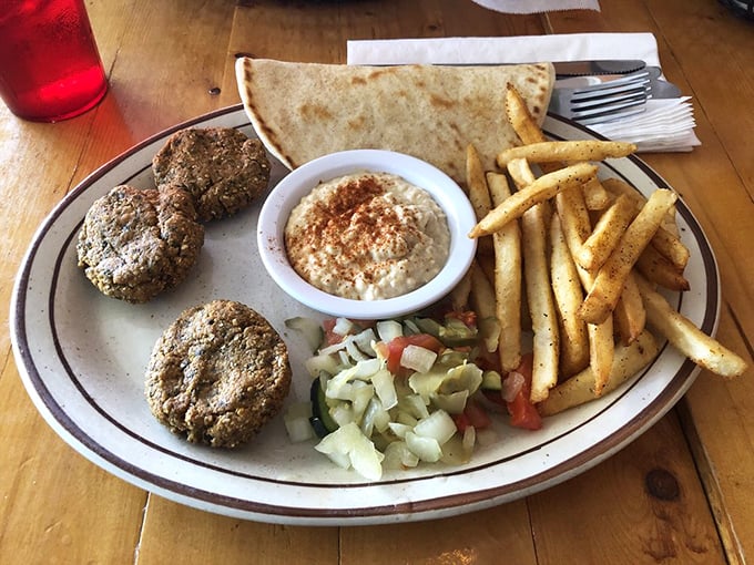 Falafel that's crispy outside, tender inside – served with hummus that's smoother than a jazz saxophone solo on a summer night.
