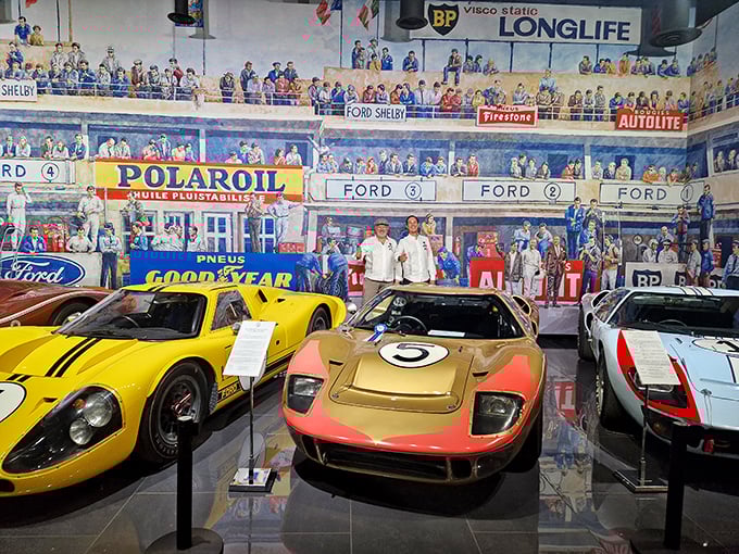 Ford's Le Mans-winning GT40s, displayed against a racing mural backdrop – like seeing the Beatles reunited on stage with their greatest hits.