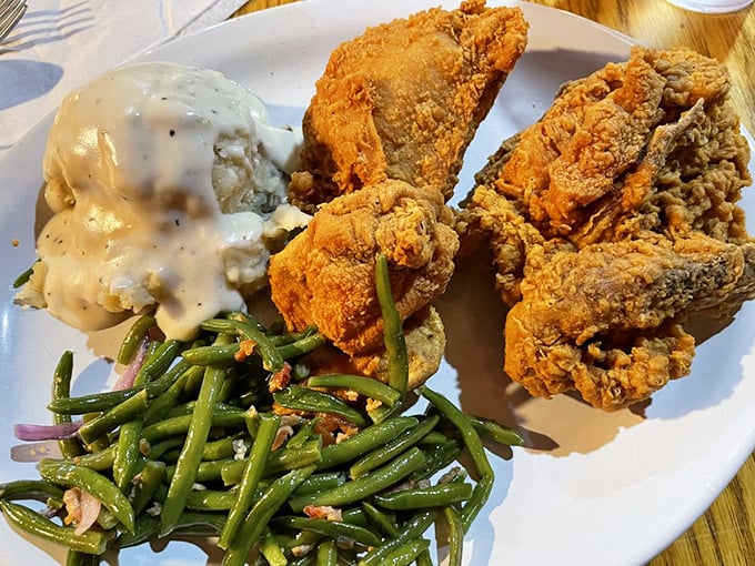 Golden-brown fried chicken that would make your grandmother both proud and jealous. Those green beans have bacon—because Kansas knows.