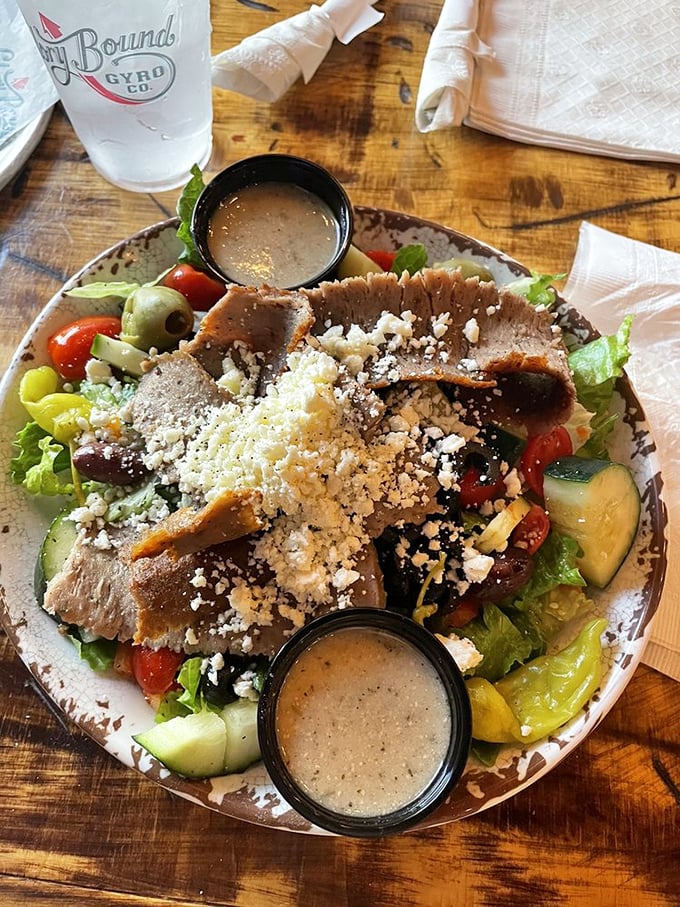 This Greek salad isn't just eating your vegetables—it's a Mediterranean vacation for your taste buds, complete with perfectly seasoned lamb.