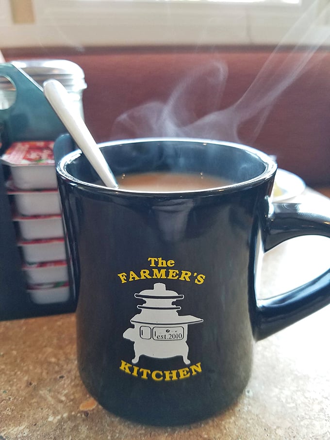 Steam rising from this robust coffee mug isn't just vapor—it's morning motivation in visible form, promising to transform zombies into functioning humans.