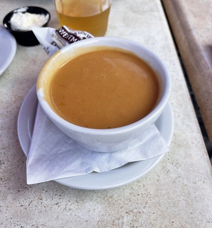 This lobster bisque isn't just soup—it's a warm, creamy hug in a bowl that makes you wonder why anyone would ever eat anything else on a chilly coastal day.