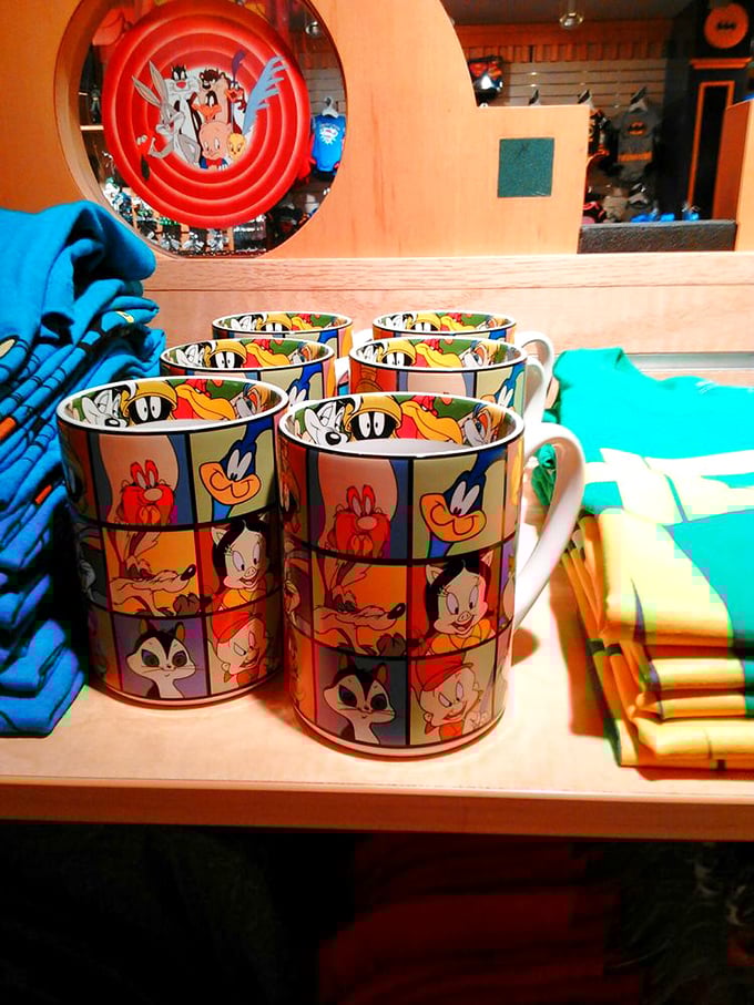 Souvenir mugs featuring classic cartoon characters—because nothing says "I survived The Boss" like sipping coffee from Bugs Bunny's face.