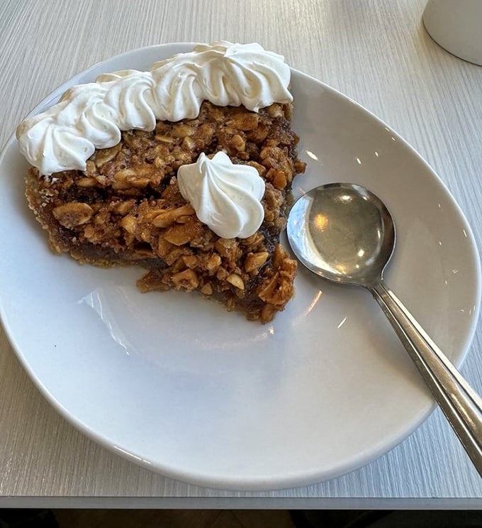 Not all heroes wear capes—some come in the form of peanut pie topped with clouds of whipped cream. Virginia's answer to pecan pie deserves its own fan club.