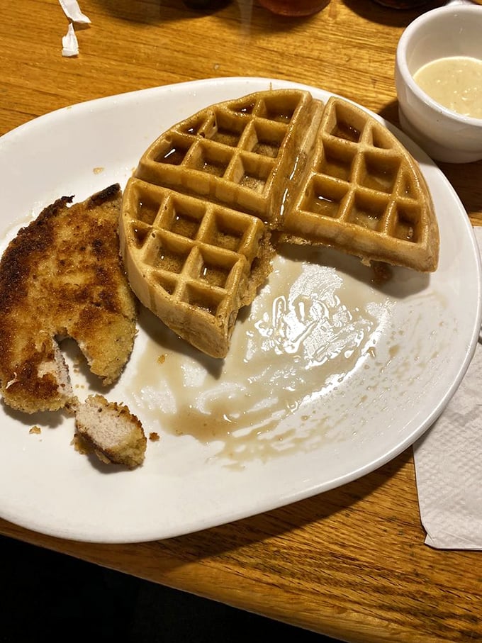 Golden waffle perfection meets crispy fried chicken—breakfast's power couple that never disappoints. The syrup waiting in the wings is about to make this relationship even sweeter.