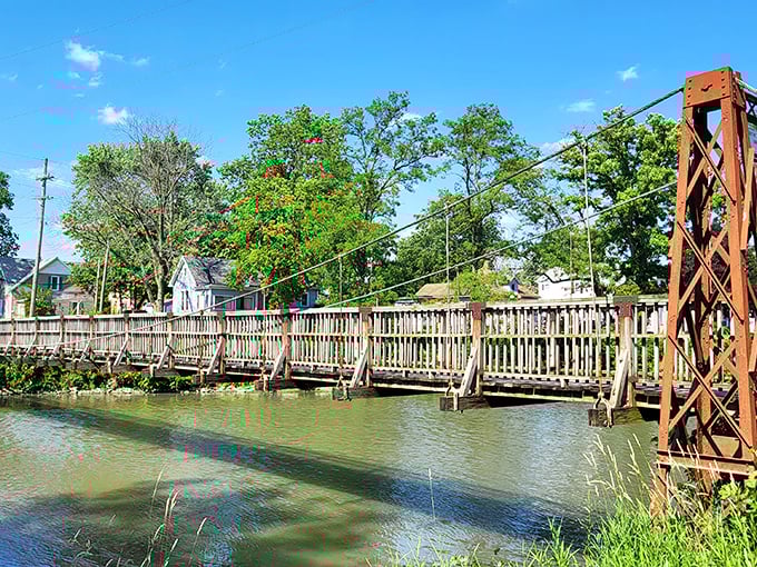 This charming footbridge doesn't just connect two riverbanks – it links present-day strollers with generations who've paused mid-crossing to watch the water flow beneath.