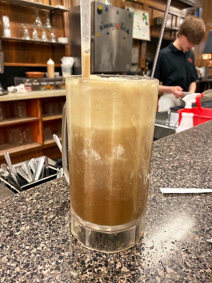 This root beer float isn't messing around. It means serious, frothy business in that tall glass of nostalgia.