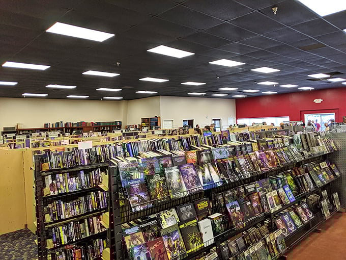 Science fiction and fantasy titles dominate these shelves—doorways to other worlds neatly organized by realm and reading level.
