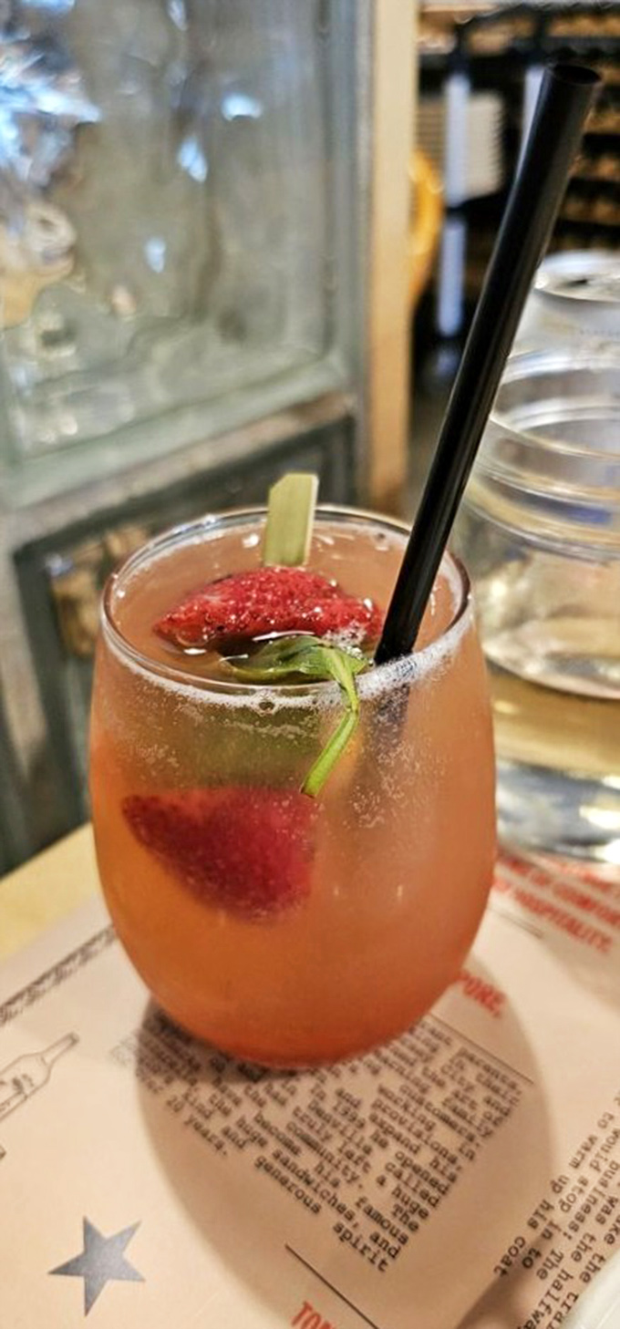 This isn't just a drink—it's summer in a glass, with strawberry and basil playing the lead roles in this refreshing production.