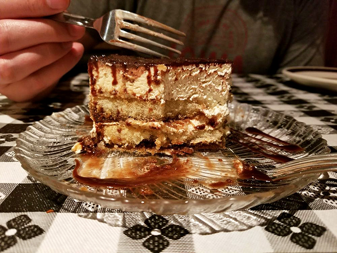 Tiramisu that strikes the perfect balance between coffee-soaked decadence and cloud-like mascarpone - the dessert equivalent of a standing ovation.