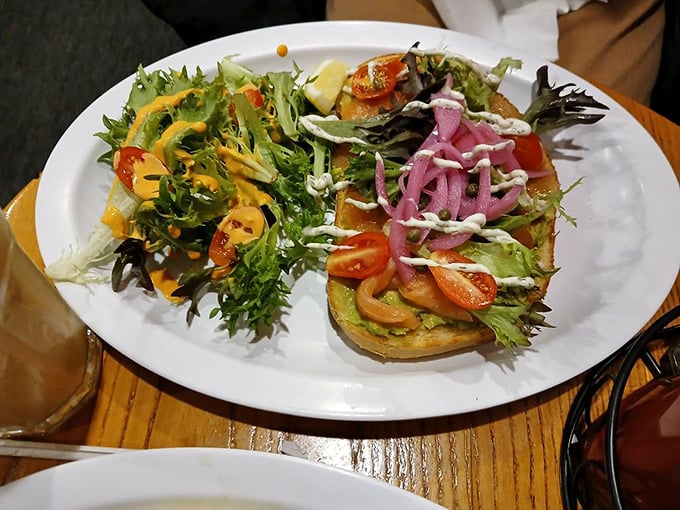 This avocado toast isn't just Instagram bait—it's a legitimate flavor explosion with vibrant toppings that justify its cult-like following.
