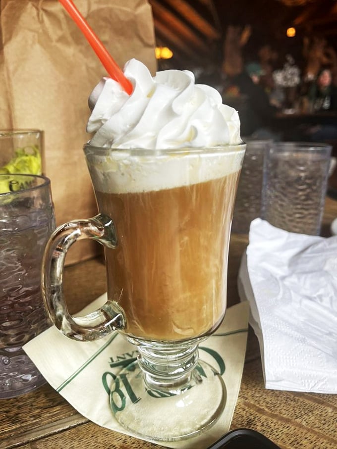 Coffee elevated to an art form—where whipped cream mountains float atop a steaming lake of liquid motivation.
