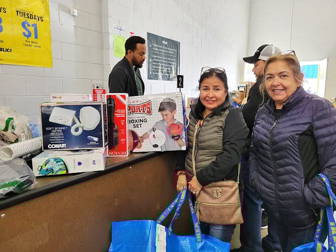 Victory at the checkout counter! Those smiles aren't just about saving money – they're about the thrill of the unexpected find.