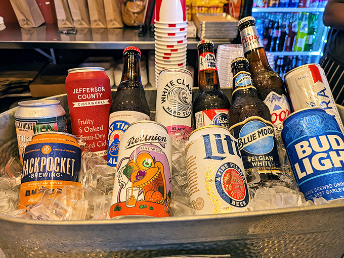 The beer selection—where local craft brews mingle with old favorites—because great barbecue deserves a proper liquid companion for the journey.