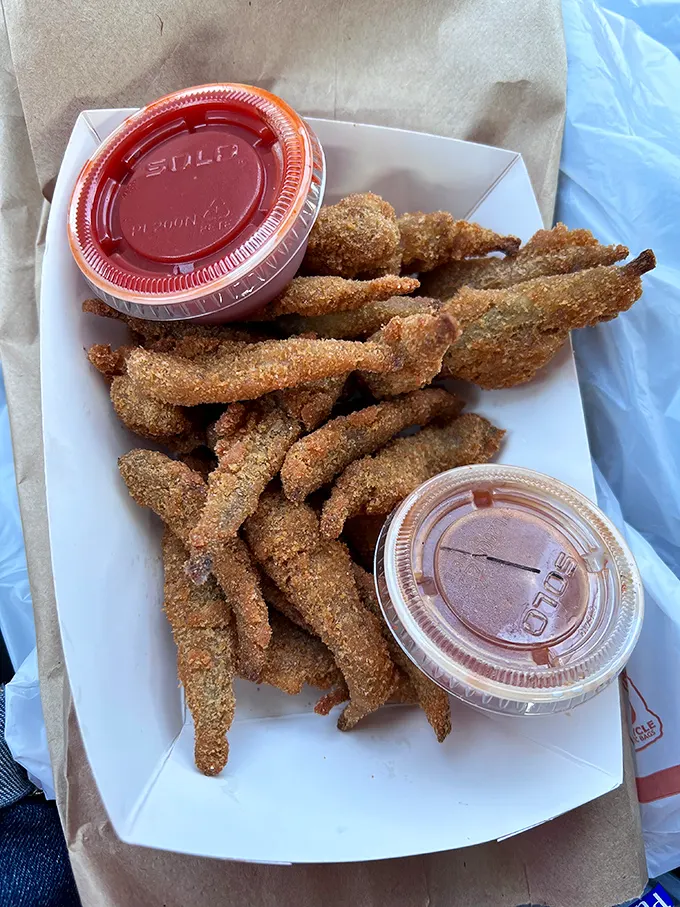 These aren't just fried smelts—they're crispy little time machines that transport Chicagoans back to childhood lake trips and family fish fries.