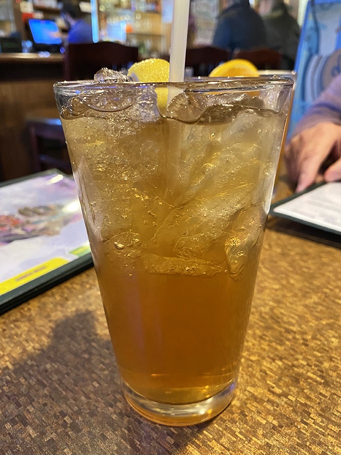 That refreshing tall glass of iced tea – the unofficial accompaniment to every proper Southern meal and seafood feast.