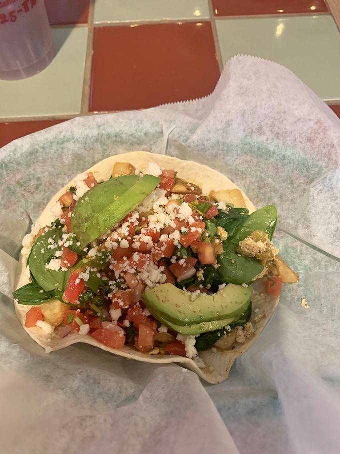 Simple yet spectacular—this taco proves that plant-based eating can be an indulgence rather than a sacrifice. Those lime wedges are calling your name.