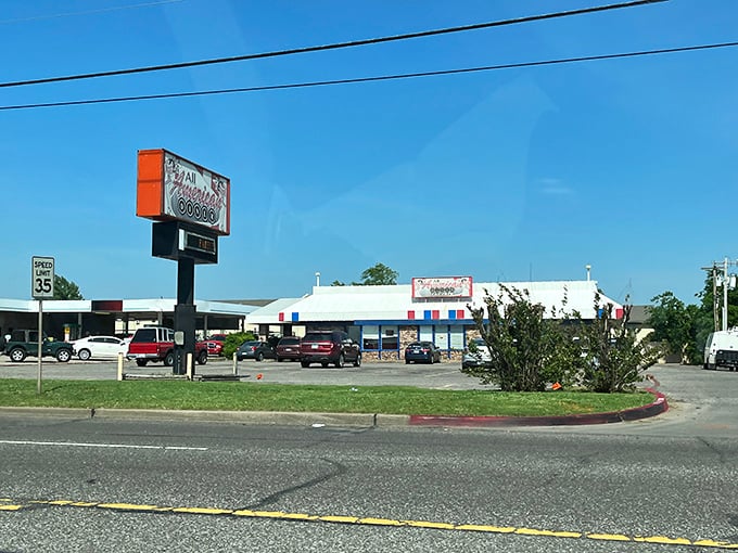 All American Diner wears its patriotic colors proudly – red, white, blue, and the golden brown of perfect hash browns.