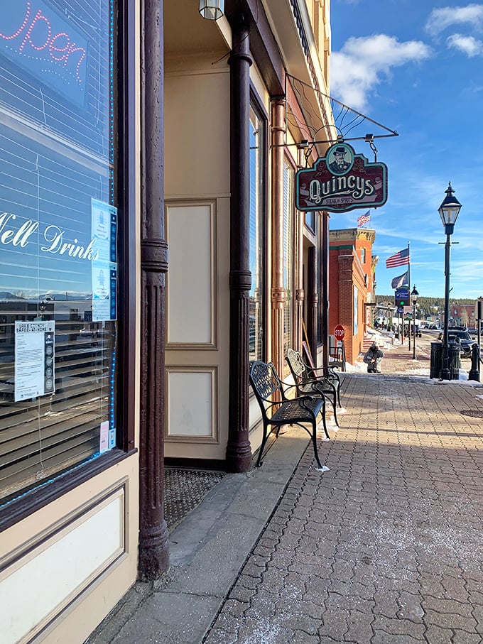 Quincy's (exterior sign): "That vintage sign isn't just advertising—it's a time machine to when steakhouses knew exactly what they were about."