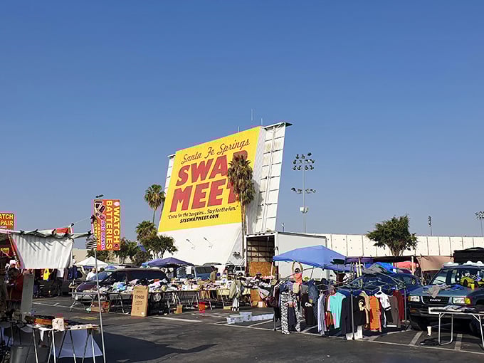 The iconic yellow sign of Santa Fe Springs Swap Meet beckons like a beacon to bargain hunters across Southern California.