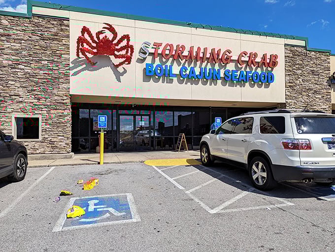That giant red crab isn't just a mascot—it's a warning that delicious chaos awaits inside.