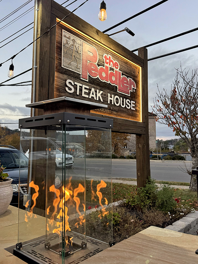 That illuminated sign is basically a lighthouse for hungry travelers searching for the shores of Steak Paradise.