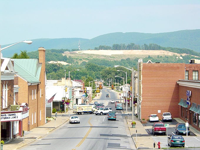 That distant steeple, the old marquee, and those rolling hills? It’s like a postcard that never went out of style.