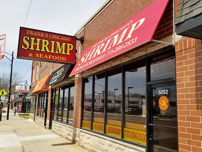 The bright red awning isn't just for show—it's marking the spot where shrimp dreams come true. Frank's modest exterior hides crispy seafood perfection.
