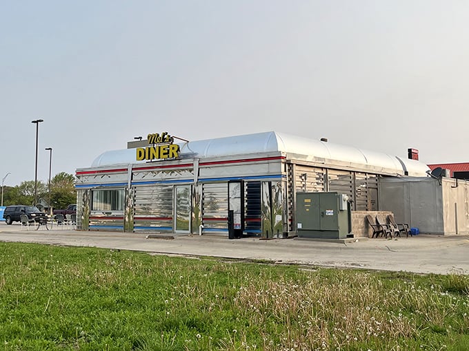 That classic silver exterior with bold yellow signage promises a nostalgic meal that delivers on flavor without the modern-day fuss.