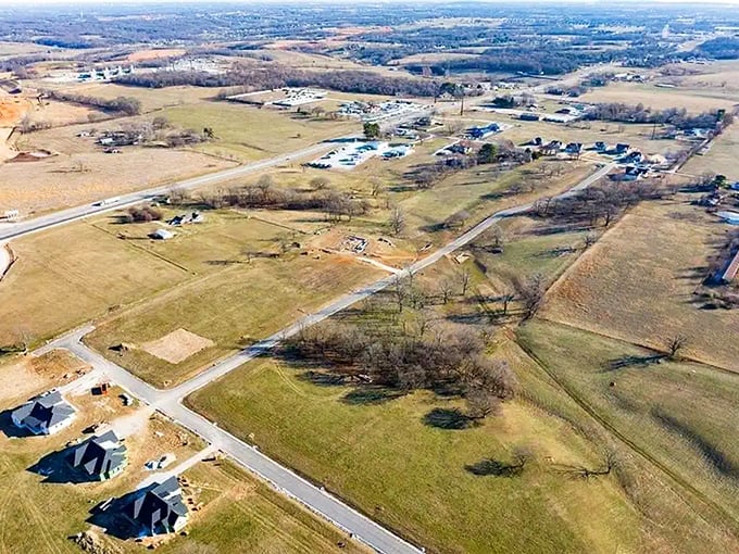 Tontitown's aerial view reveals the perfect balance of green spaces and community – breathing room included.