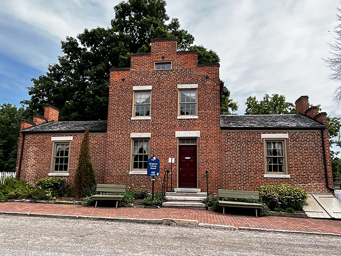 The Brigham Young Home sits in quiet dignity, its sturdy brick construction and simple design reflecting the practical ideals of early settlers.
