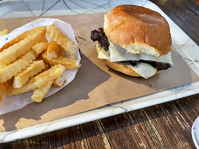 The perfect burger doesn't exi—oh wait, here it is, keeping company with fries so perfectly golden they deserve their own Instagram account.