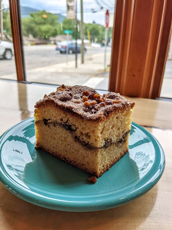 Coffee cake that actually deserves to be mentioned in the same sentence as coffee. The cinnamon-sugar topping crumbles with each fork touch, revealing moist perfection beneath.