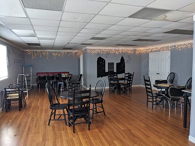 The dining room feels like that friend's house where you always feel welcome—string lights, wooden floors, and the promise of ice cream.