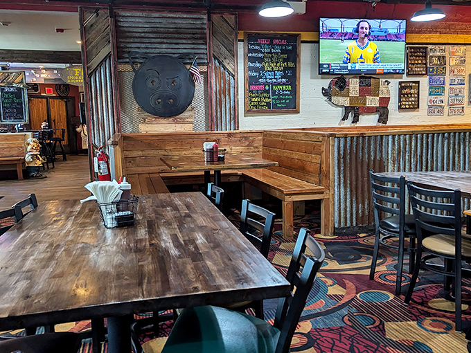 The dining room marries rustic charm with barbecue functionality—those wooden tables have witnessed more "food euphoria" moments than a cooking show highlight reel.