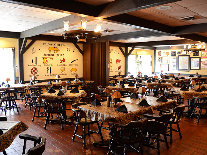 The dining room doesn't just seat people—it transports them. Those wooden beams and folk art aren't decoration; they're a portal to a Bavarian village feast.