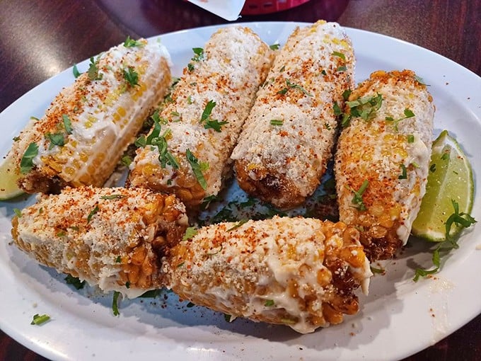 Mexican street corn dressed in its Sunday best—slathered with creamy goodness and dusted with spices. Corn has never felt so honored.