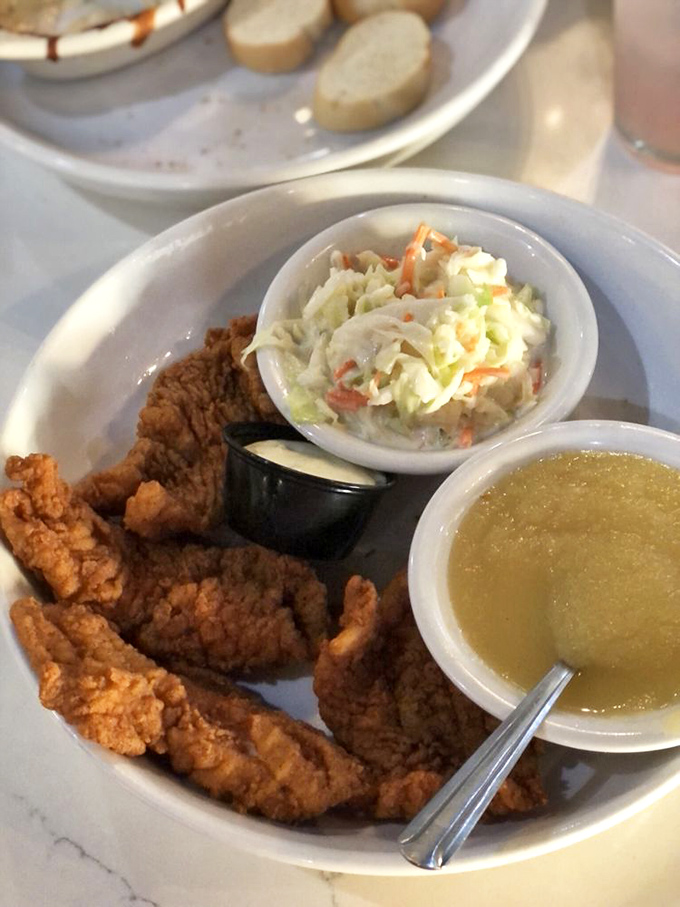 Golden-fried goodness with coleslaw that actually deserves to be eaten, not just pushed around the plate as an afterthought.
