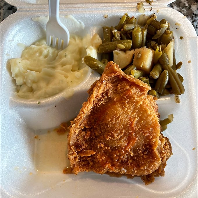 Fried chicken, mashed potatoes, and green beans—the holy trinity of Southern plates. Simple food executed with the precision of a master pianist.