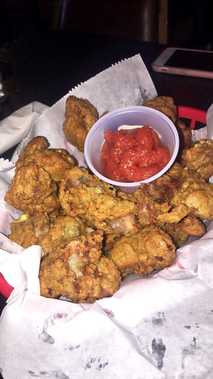 These aren't just any gizzards—they're the reason people who "don't eat that stuff" suddenly develop curious forks after their second beer.