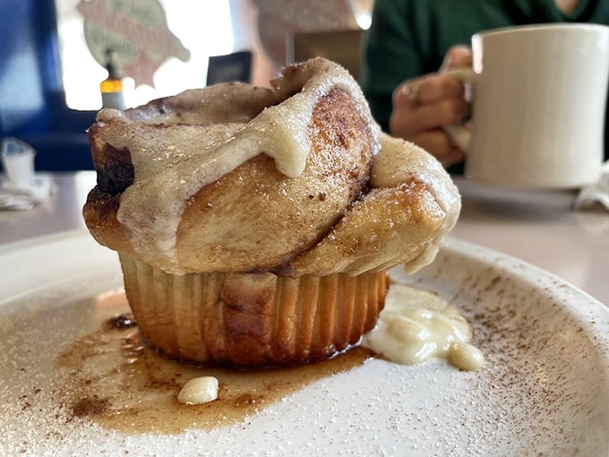 A cinnamon roll that doesn't just speak to your soul—it serenades it with a full orchestra. Worth every sticky finger and guilty smile.