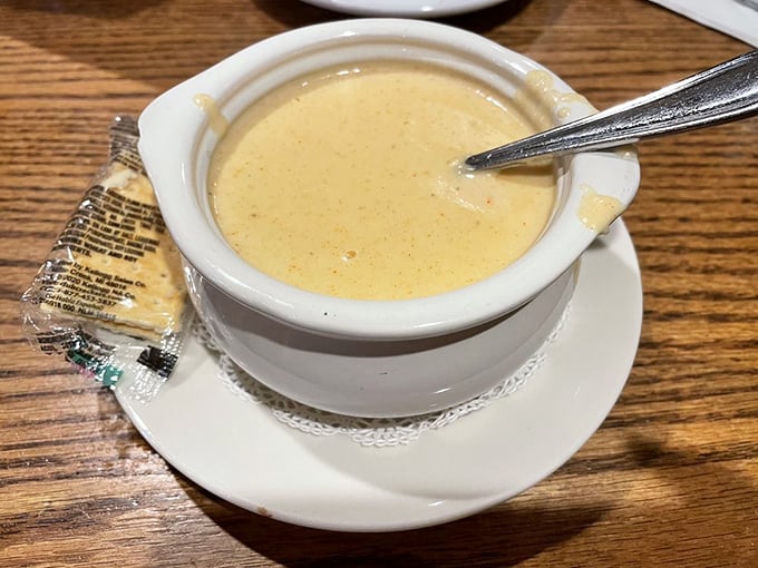 A bowl of lobster bisque that whispers sweet nothings to your taste buds—creamy, rich, and worth every calorie.