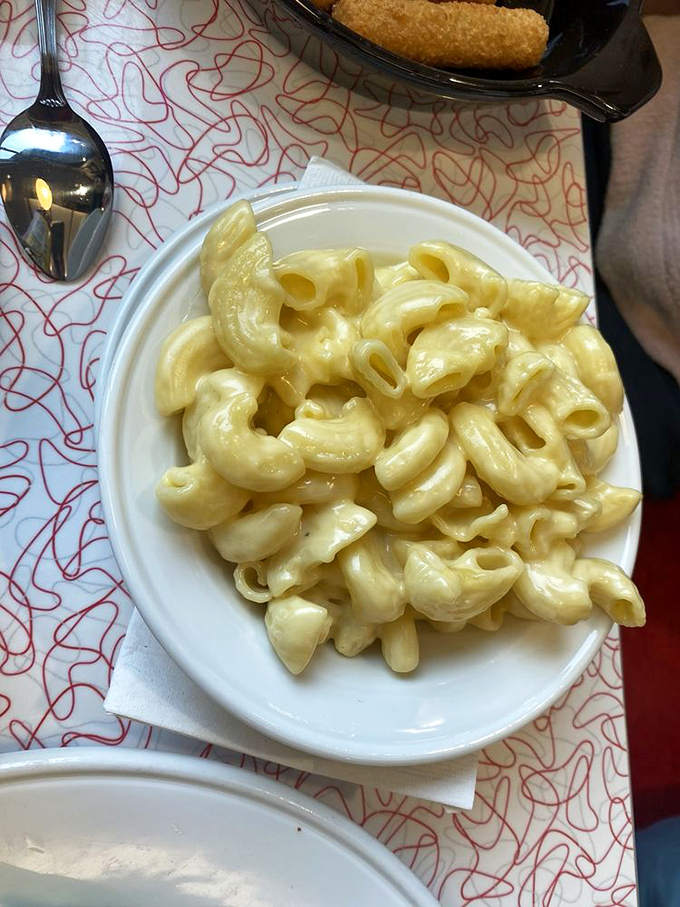 Mac and cheese so creamy it should be illegal. Each spiral pasta acts as a little cheese delivery vehicle straight to your happiness center.