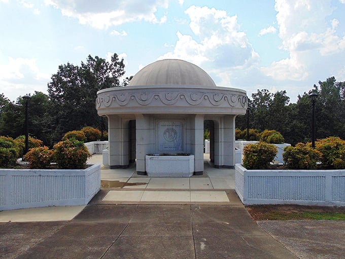 This elegant pavilion offers a moment of reflection, like finding that perfect piece of crystal amid a jumble of yard sale odds and ends.