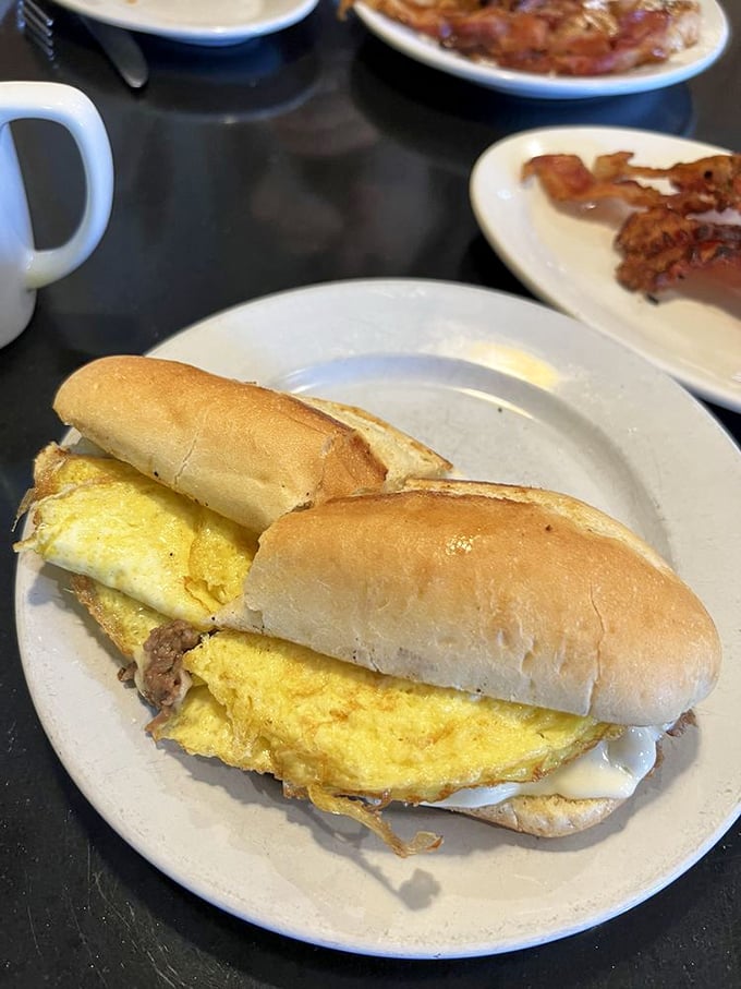 This breakfast sandwich doesn't just start your day—it launches it into orbit with eggs and meat tucked into a perfectly toasted roll.