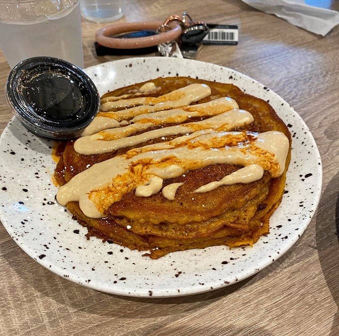 These pumpkin pancakes with cream cheese drizzle would make the Headless Horseman stop mid-chase for a breakfast break.