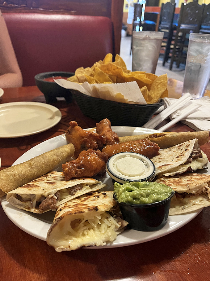 Not just any quesadilla—a fiesta of melted cheese, perfectly grilled meat, and that essential side of guacamole for dipping.