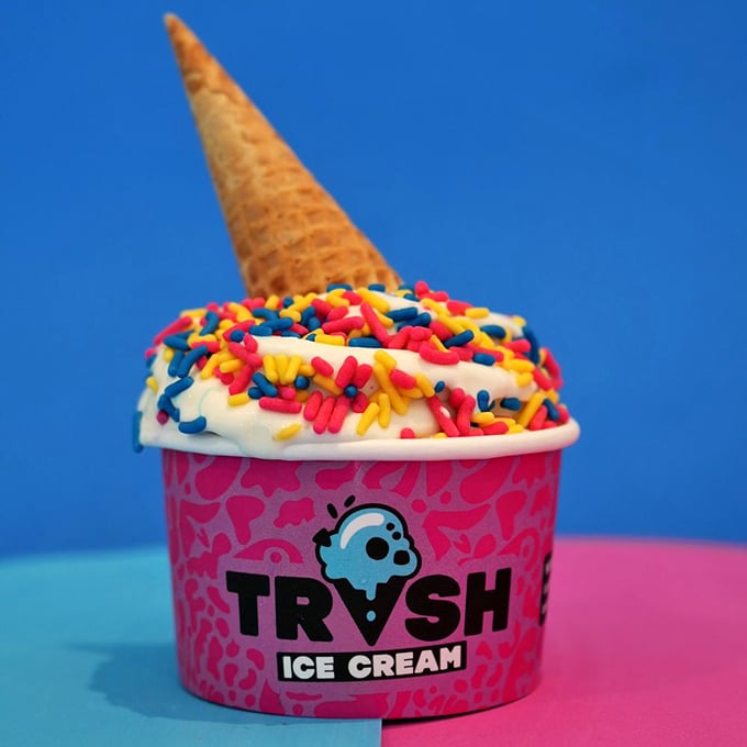 Rainbow sprinkles and a waffle cone crown make this vanilla creation look like it's dressed for the most delicious carnival you've ever attended.