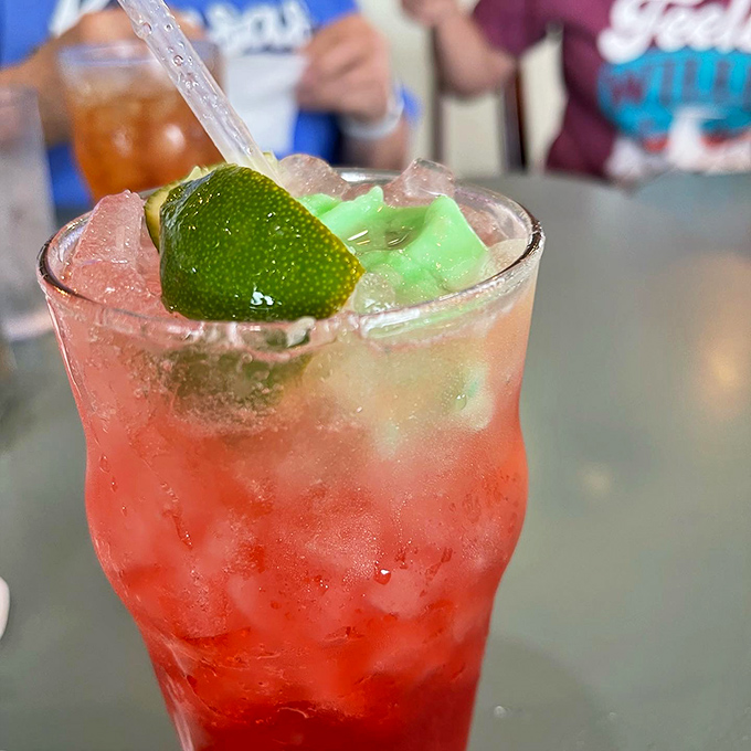 The strawberry limeade—where sweet meets tart in a glass that sparkles like Kansas sunshine after a summer storm.