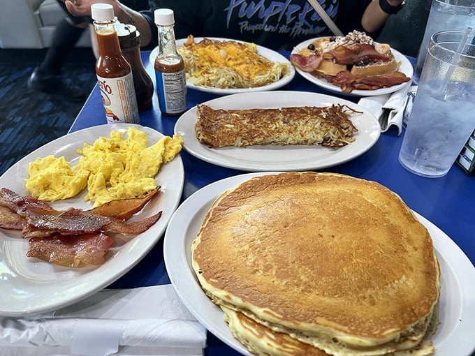 A table that tells the story of friendship through shared calories. Every great weekend memory starts with a spread like this.